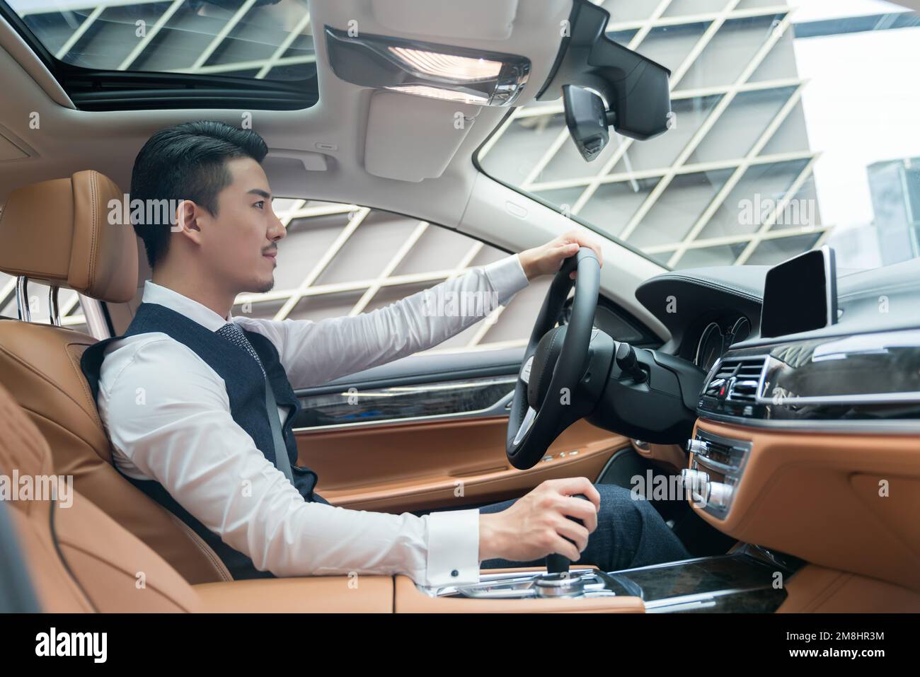 Business men driving Stock Photo - Alamy