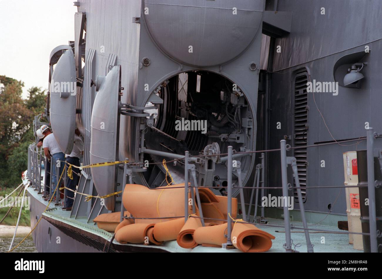 A P-15 SS-N-2c Styx SSM is unloaded from the No. 4 missile tube aboard ...