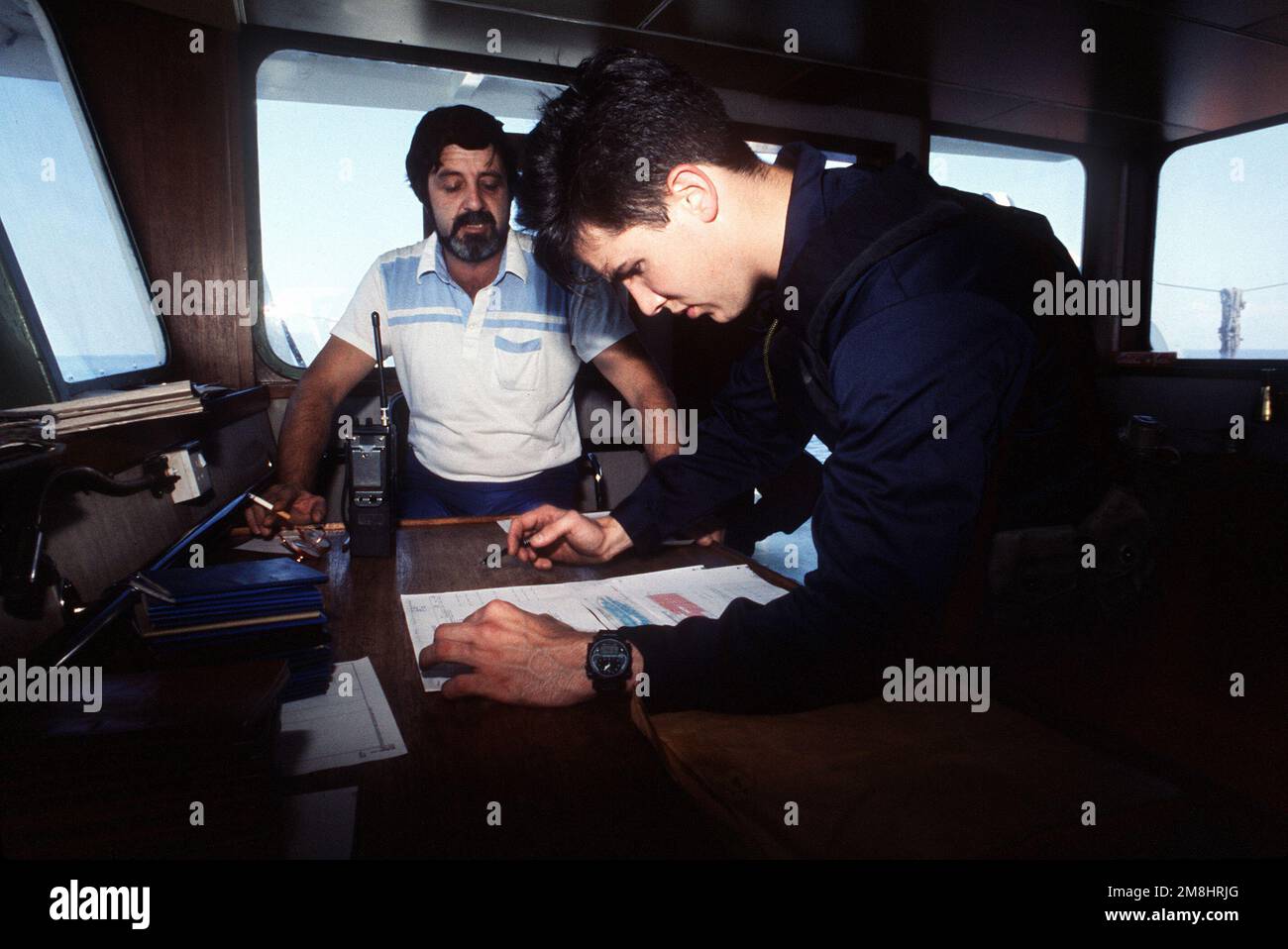 The guided missile cruiser USS NORMANDY (CG-60) boarding officer ...