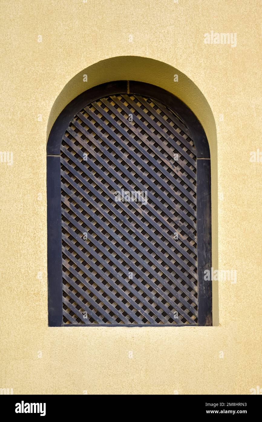Egyptian house exterior. Arched window in wall of arabic building. Copy ...
