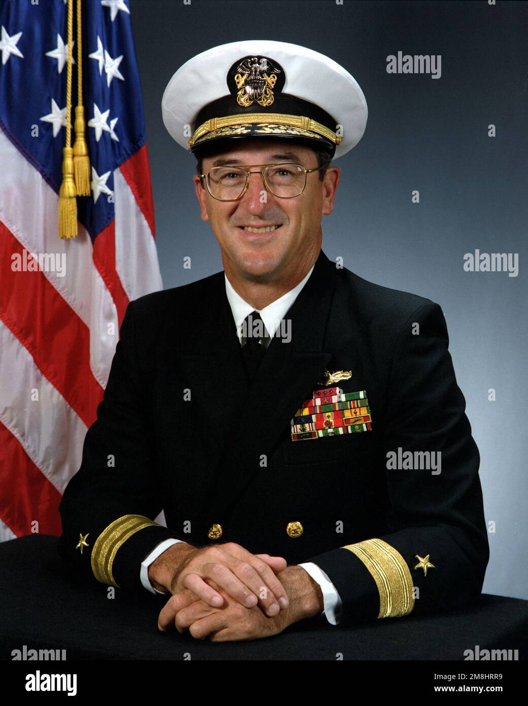 Rear Adm. (lower half) Robert Sutton, USN (covered). Country: Unknown ...