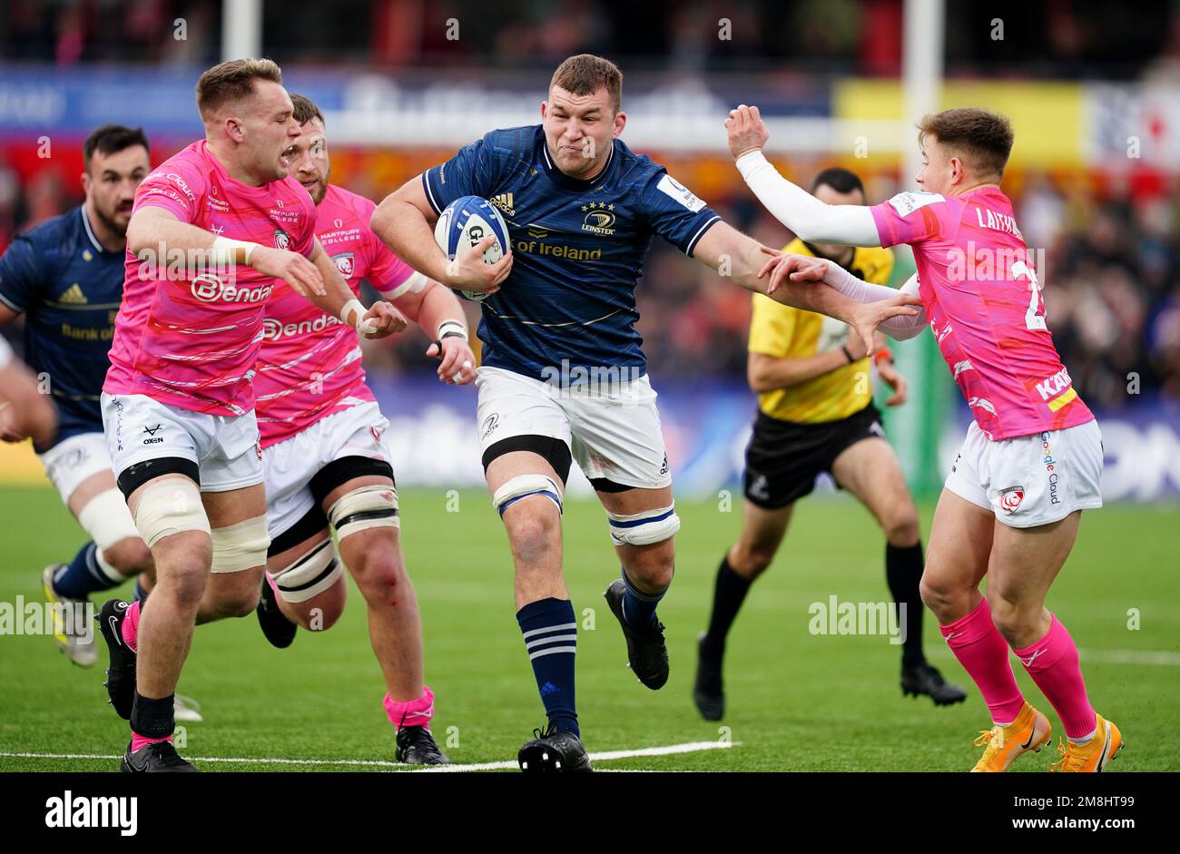 Leinster's Ross Molony (centre) hands off Gloucester's Stephen Varney ...
