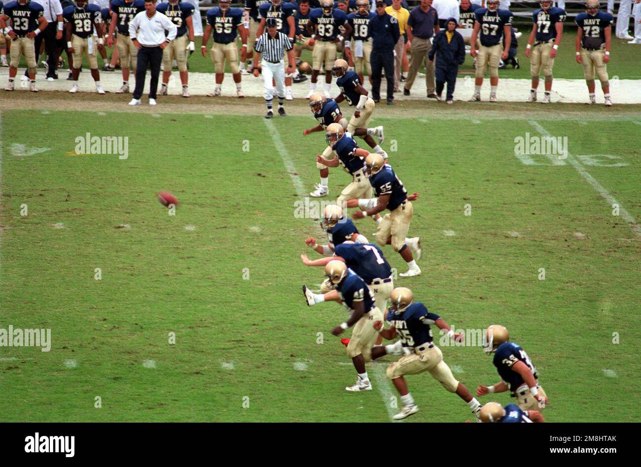 The U.S. Naval Academy football team kicks off during a game against ...