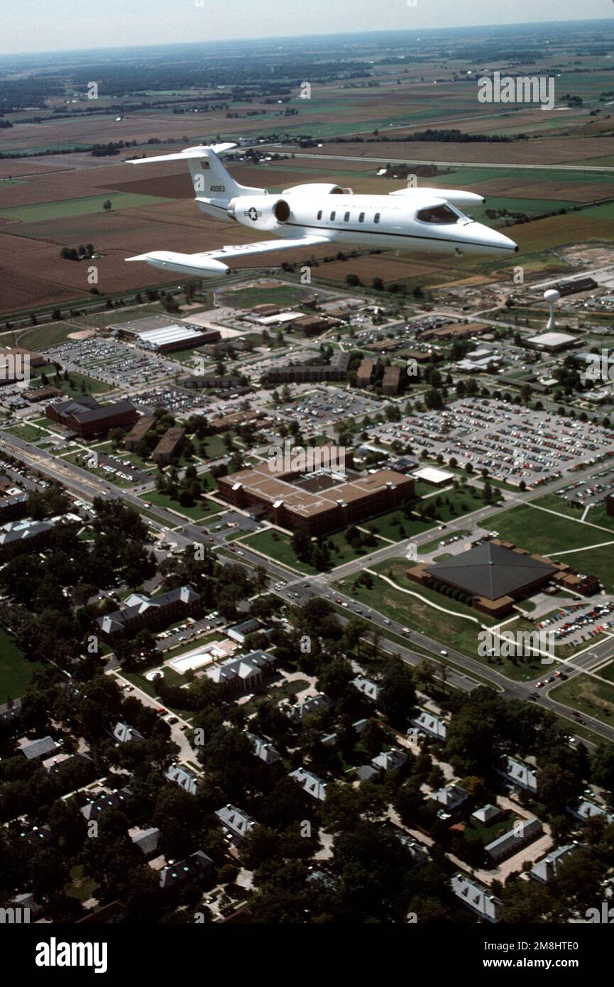 An air-to-air, three quarter front view of a Lear Jet built C-21A ...