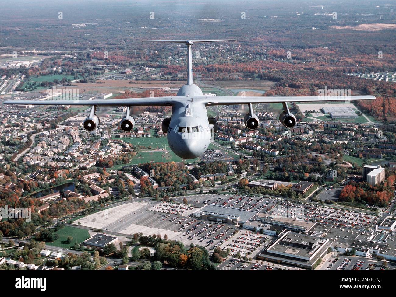 An air-to-air front view of a 438th Airlift Wing, C-141 Starlifter ...