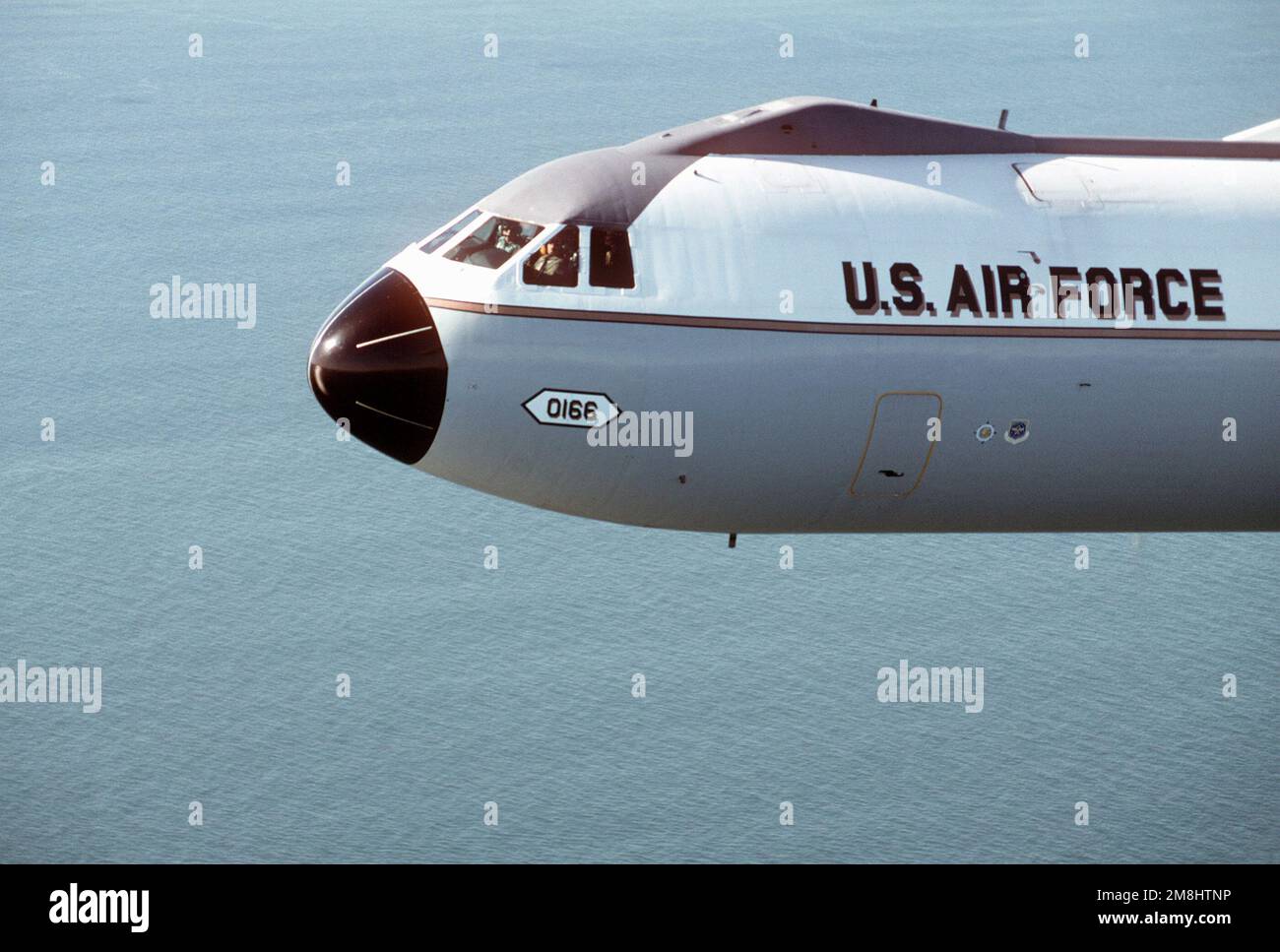 An air-to-air side view of the front of the fuselage a 438th Airlift ...