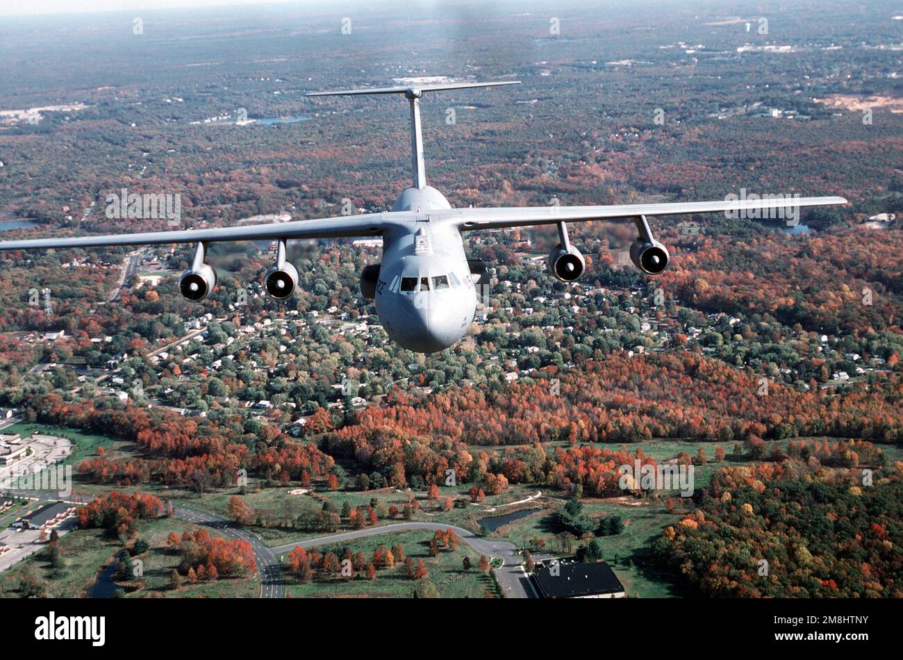 An air-to-air front view of a 438th Airlift Wing, C-141 Starlifter ...