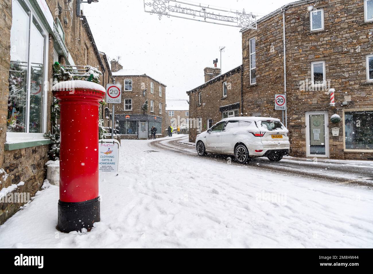Main street in Hawes, North Yorkshire, covered in snow Stock Photo - Alamy