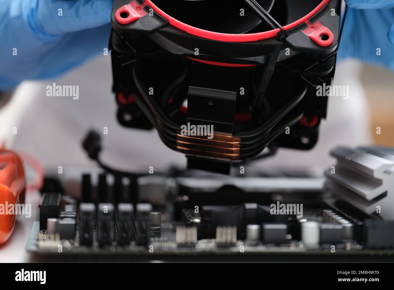 Computer technician installs computer cooling system closeup Stock ...