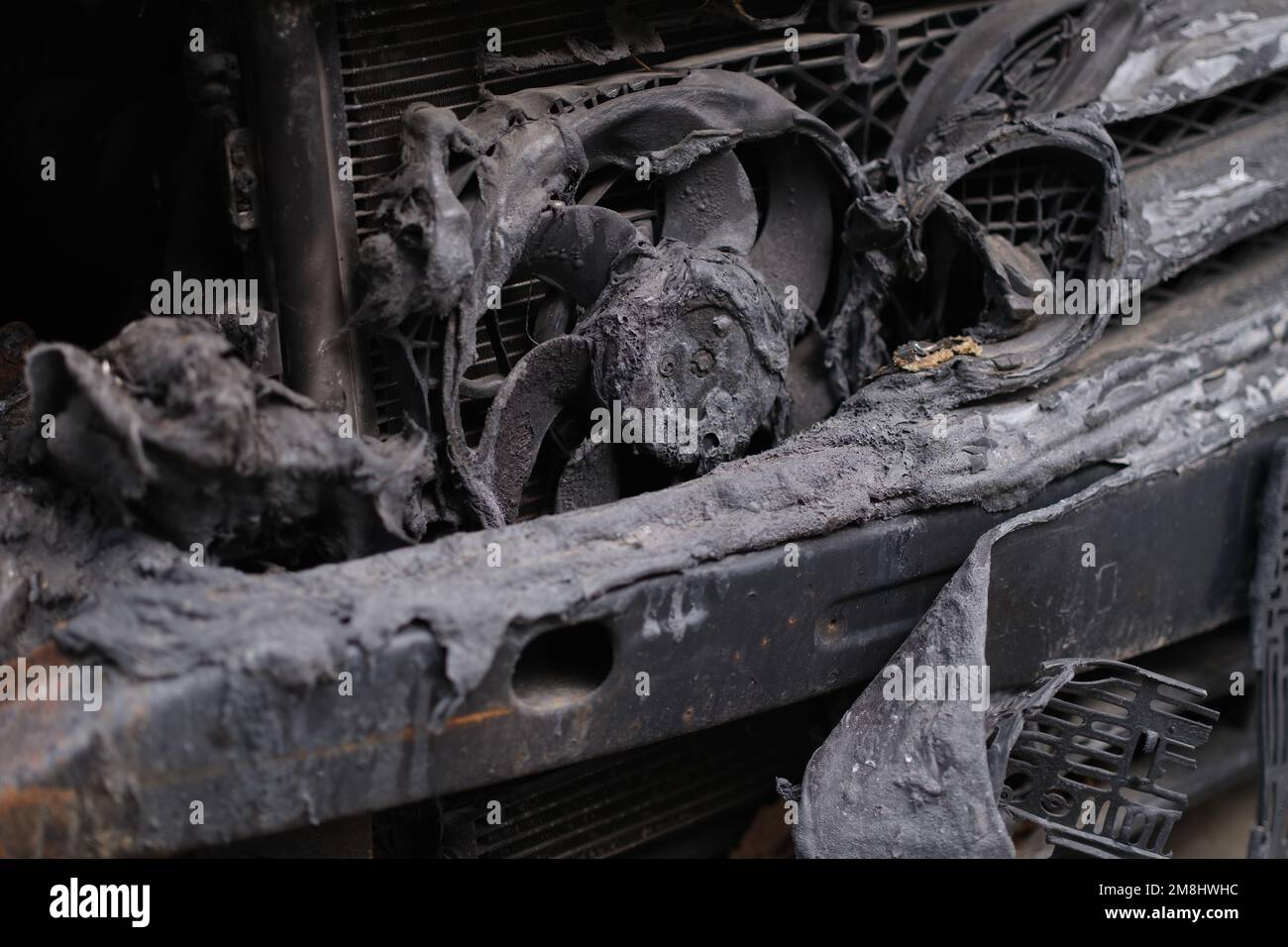 Burnt engine compartment of modern car closeup Stock Photo - Alamy