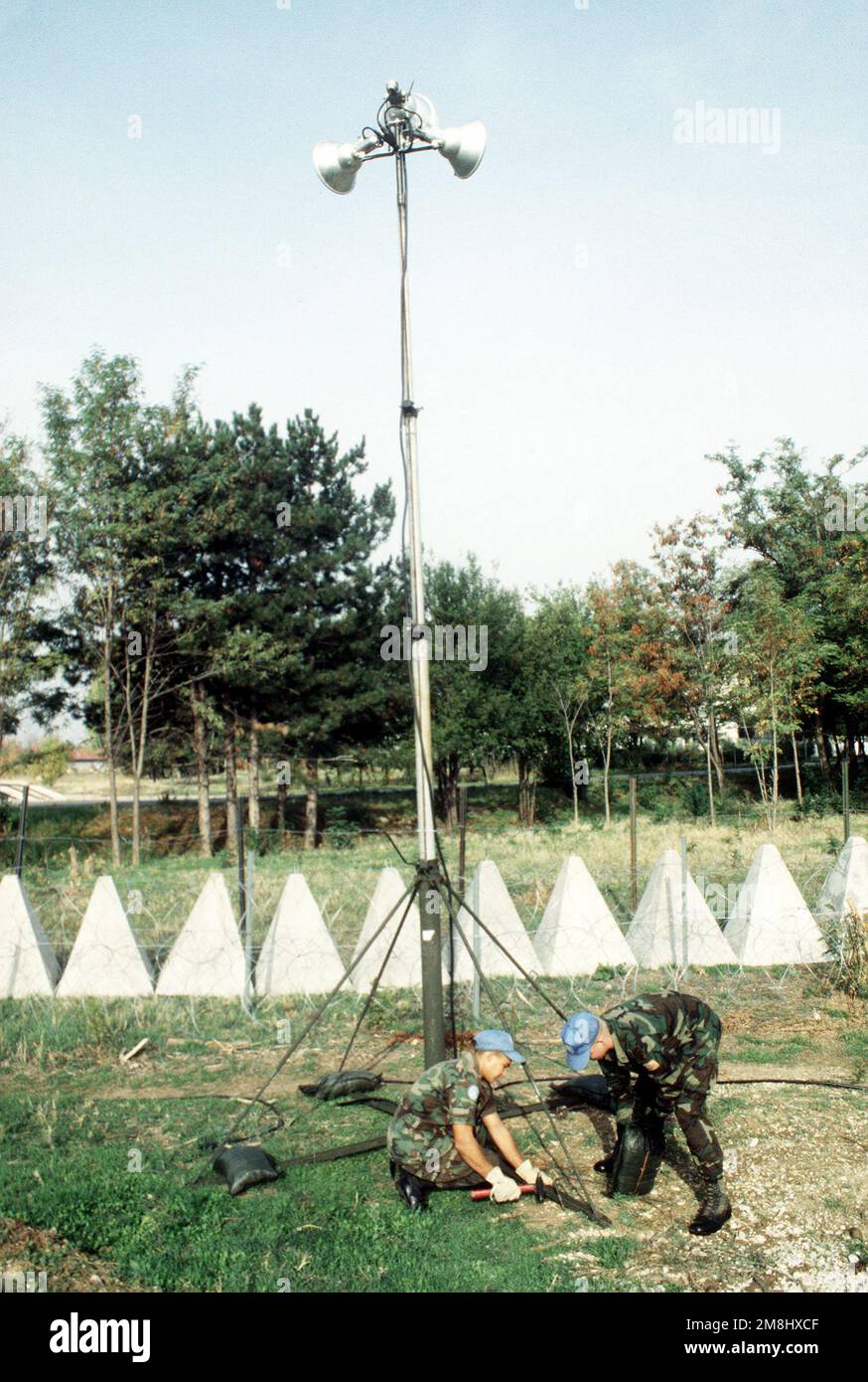 Perimeter lights being set-up at the Base Camp. Subject Operation ...