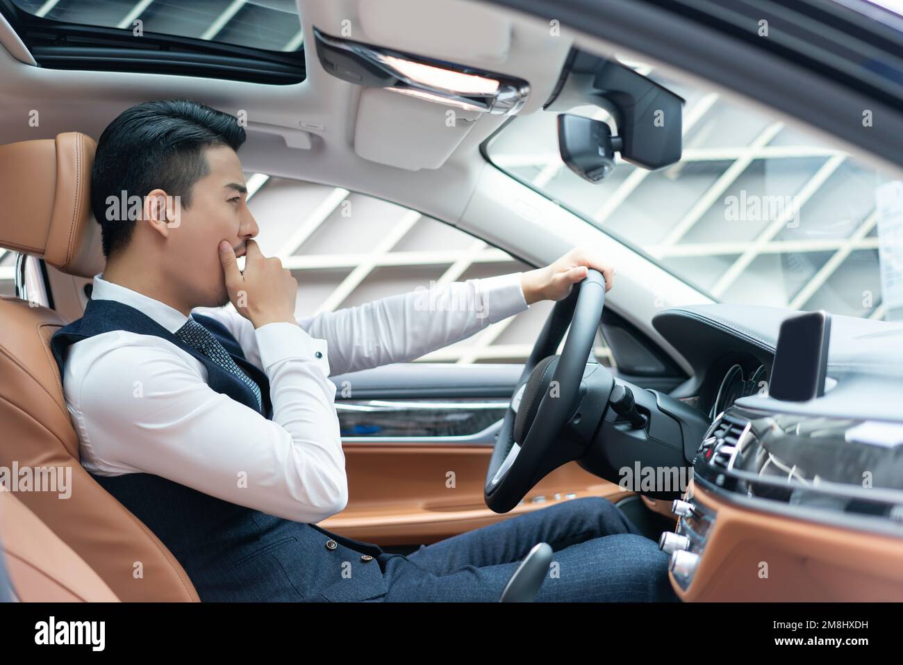 Business men driving Stock Photo - Alamy