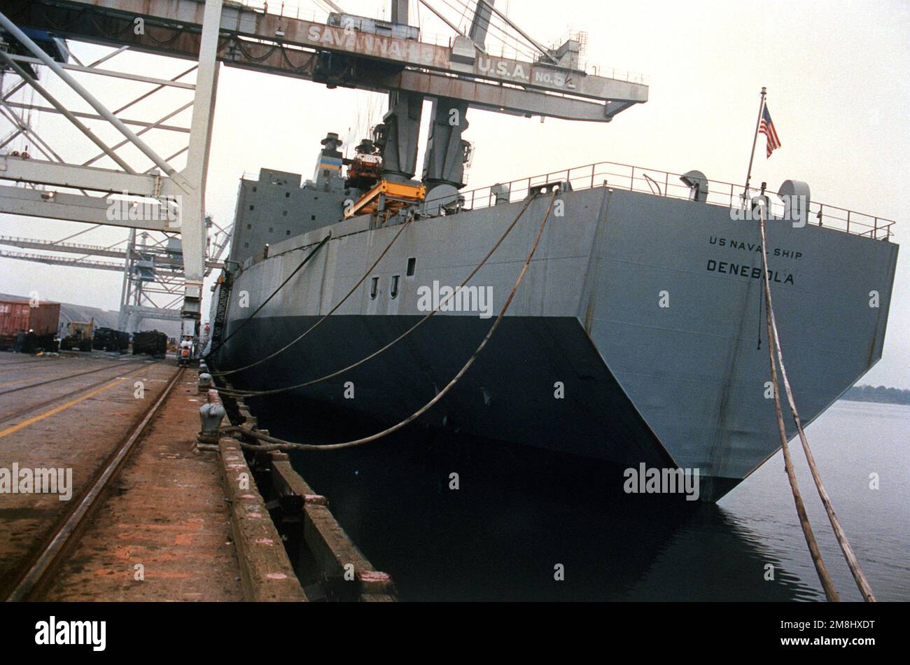 An aft view of the USNS DENEBOLA which is being loaded with equipment ...
