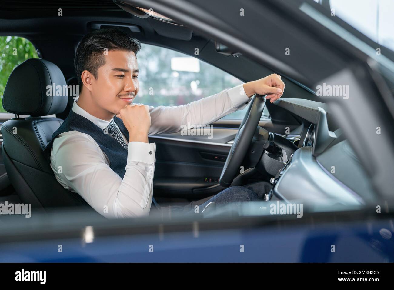Business men driving Stock Photo - Alamy