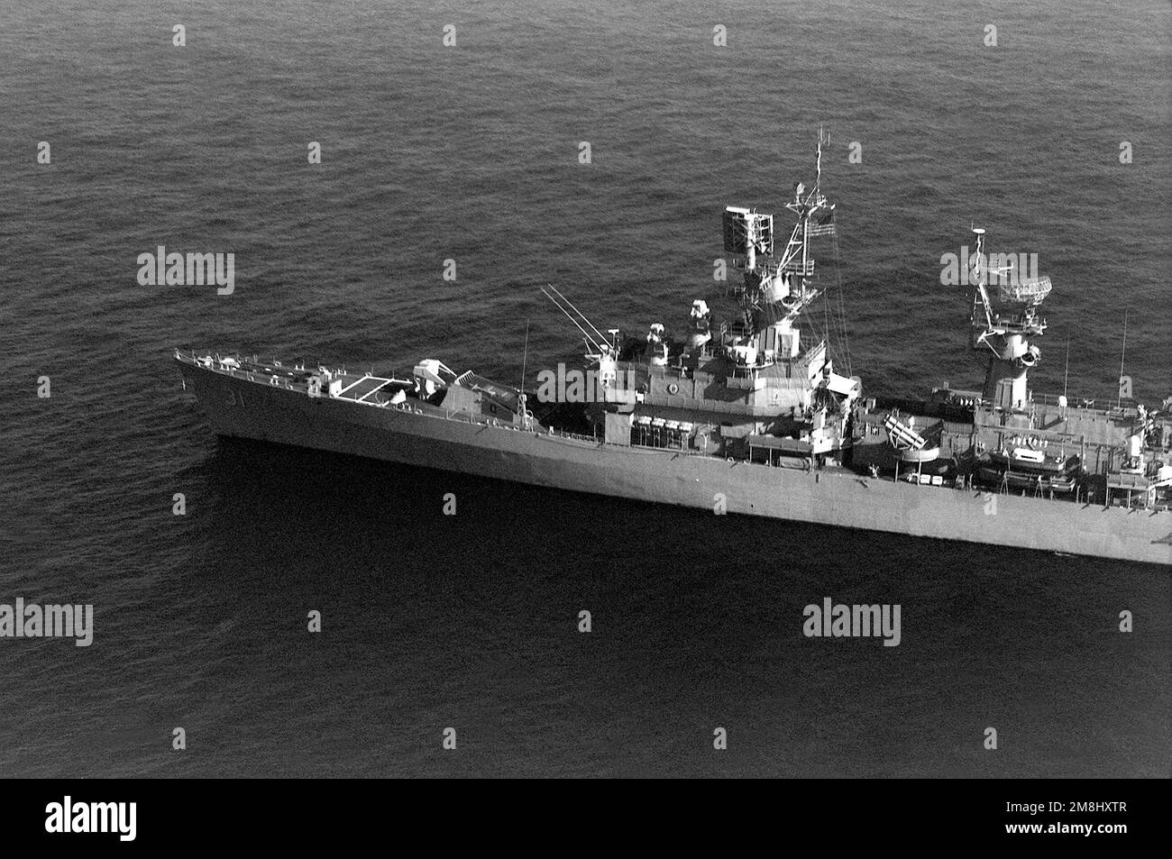 Aerial port side view of the amidships and fore section of the Belknap ...