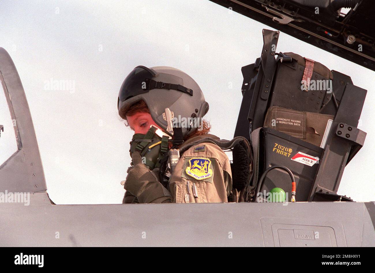 A close up view of 1ST LT. Jeannie Flynn as she sits in the cockpit of ...