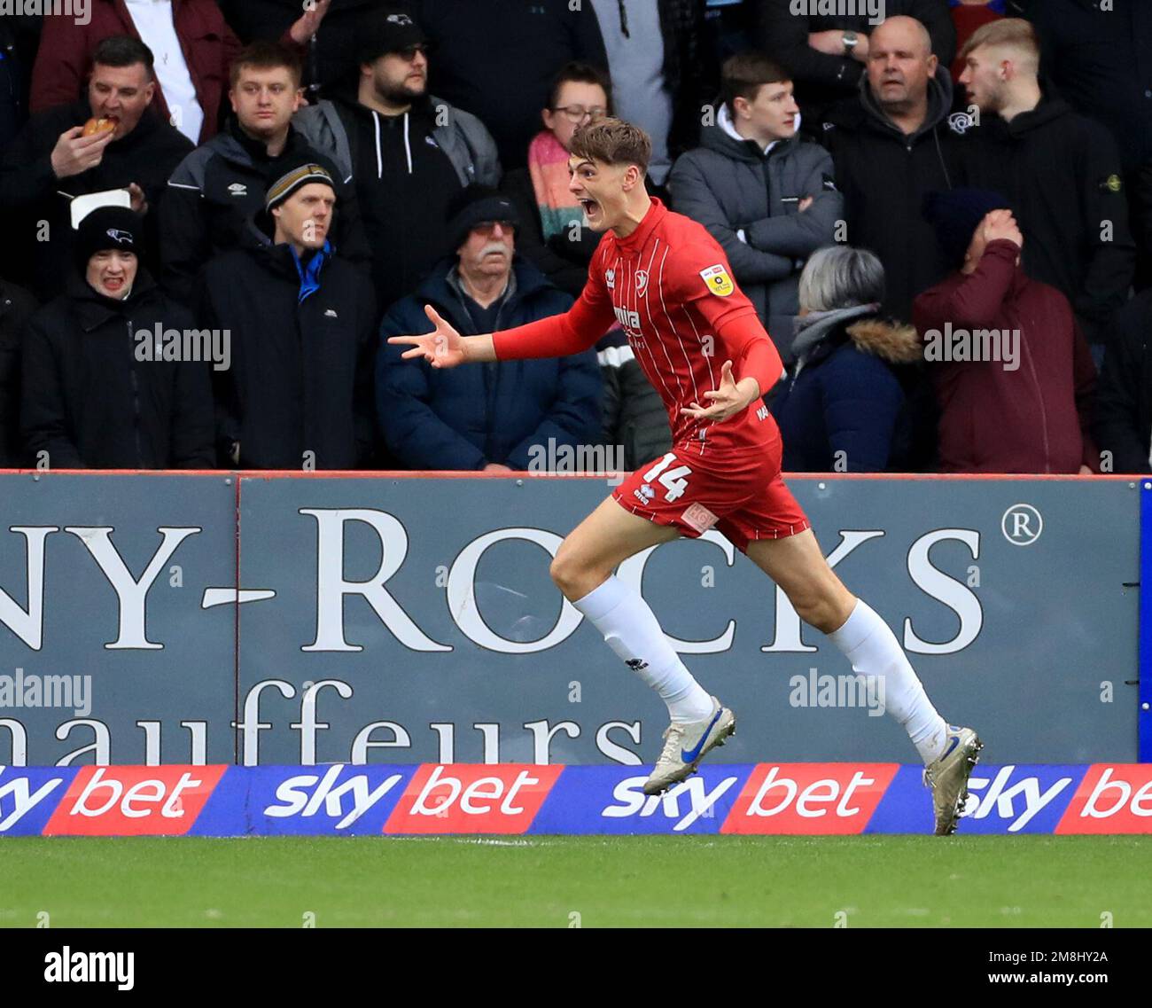 Cheltenham Town's Caleb Taylor celebrates scoring the first goal of the ...