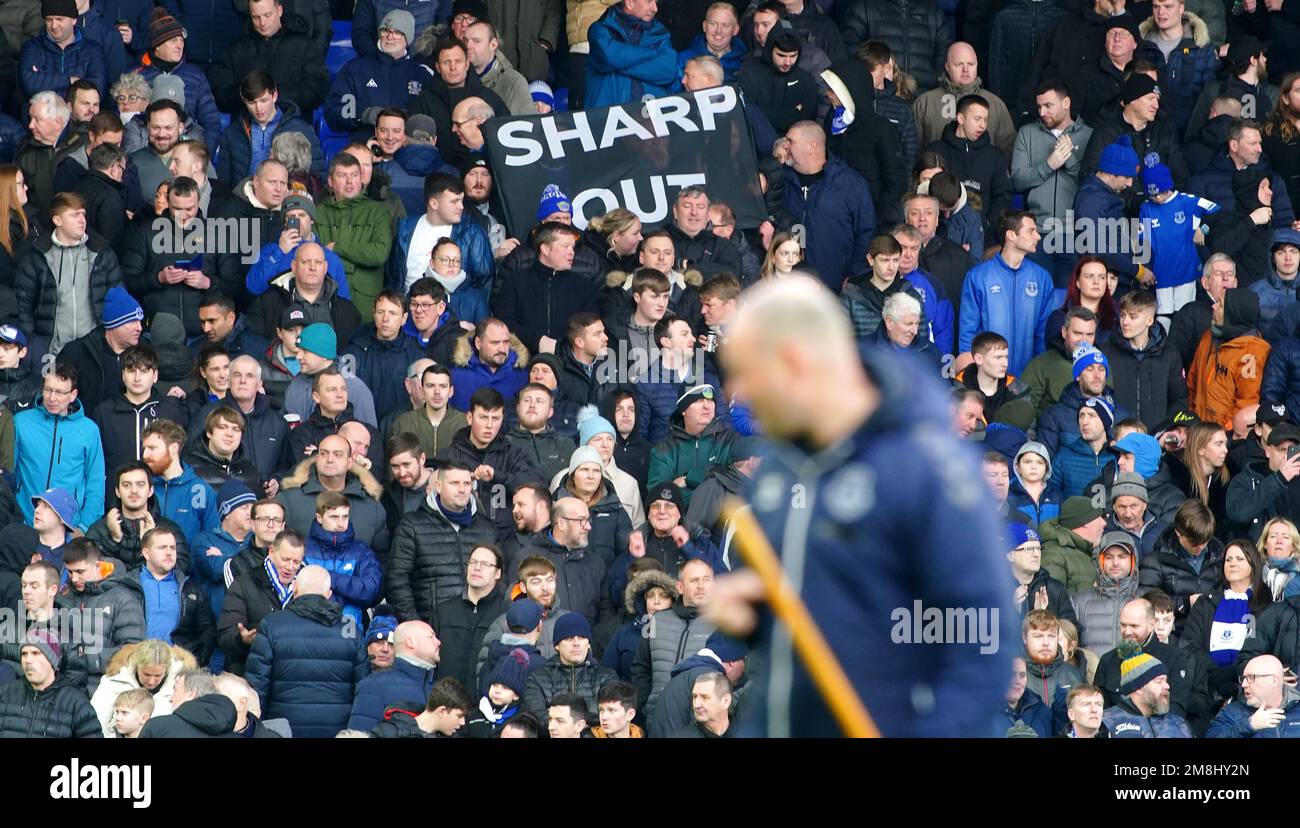 Everton fans hold up banners in protest against the clubs board ahead ...