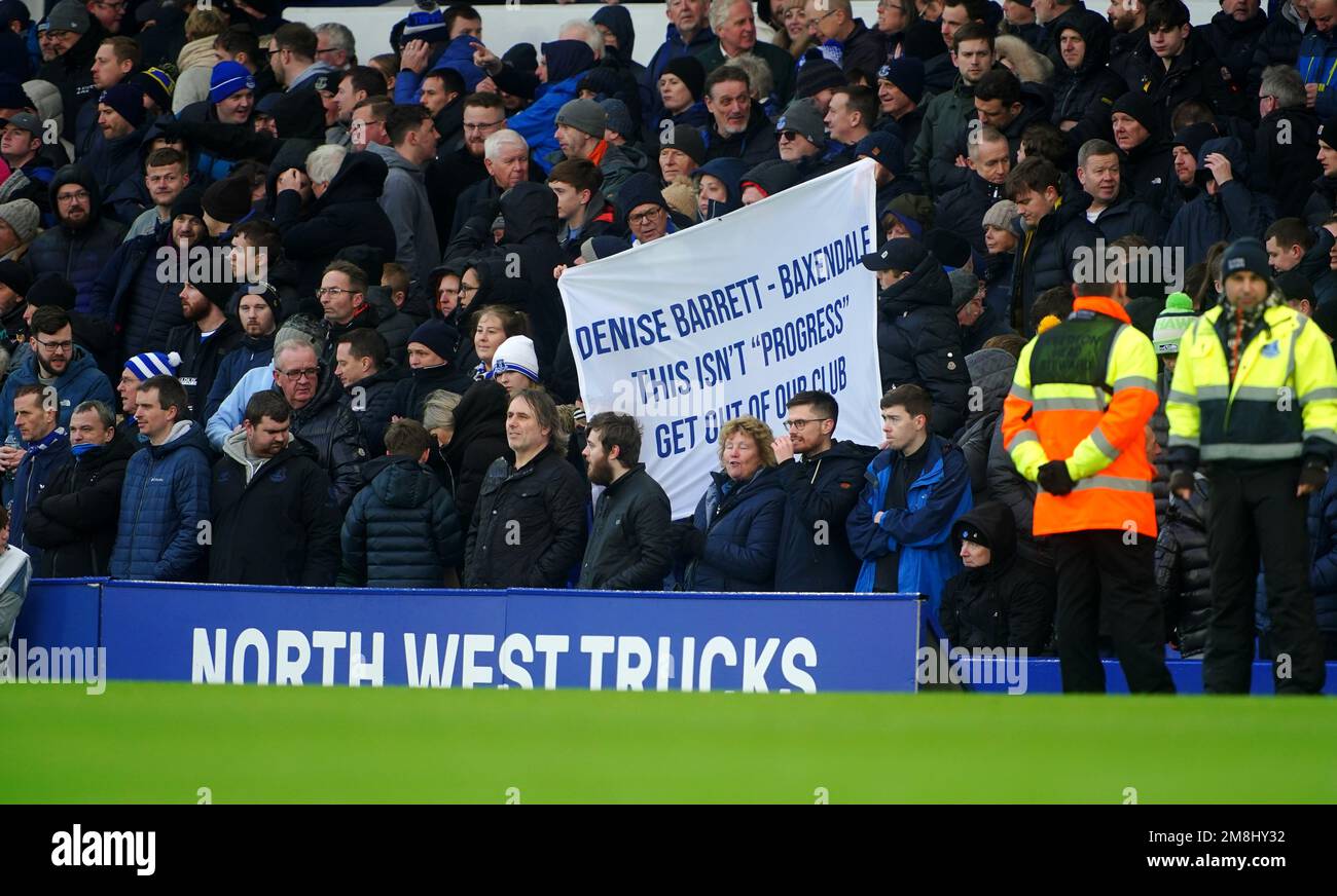 Everton fans hold up banners in protest against the clubs board ahead ...