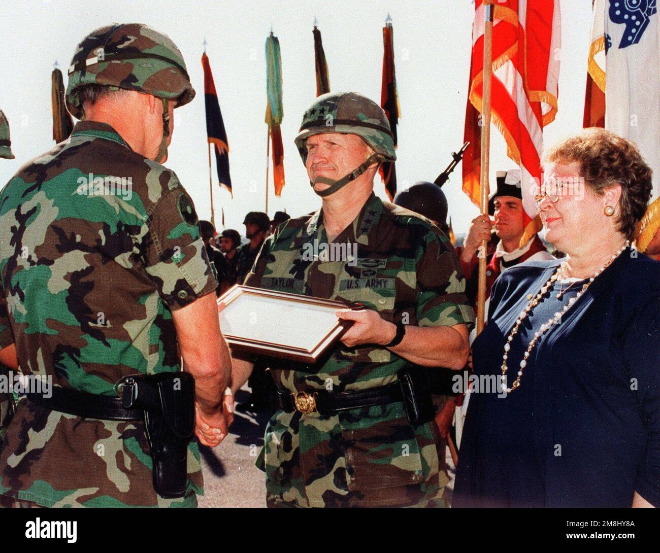 Forces Command (FORSCOM) Commander, General Dennis J. Reimer, presents ...