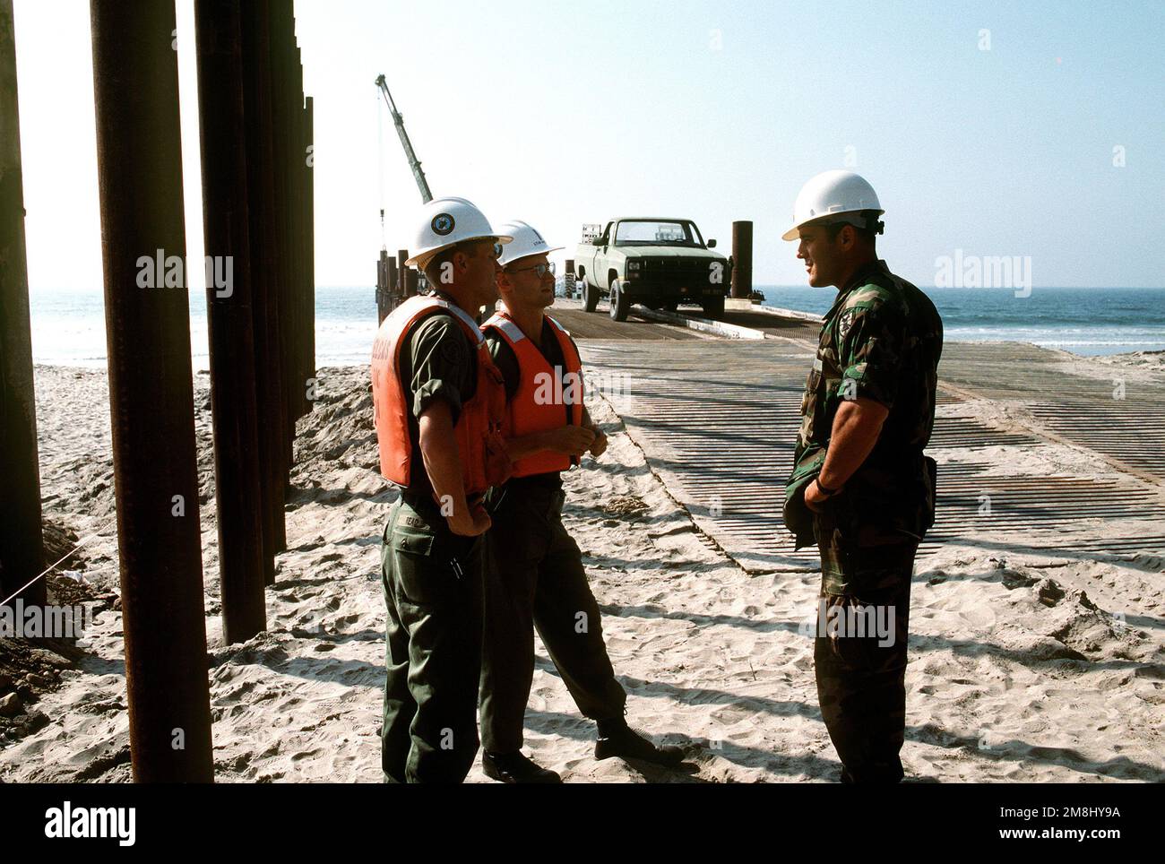 U.S. Army's 1ST LT. Albert E. Quaye (right) of the 497th Engineering ...