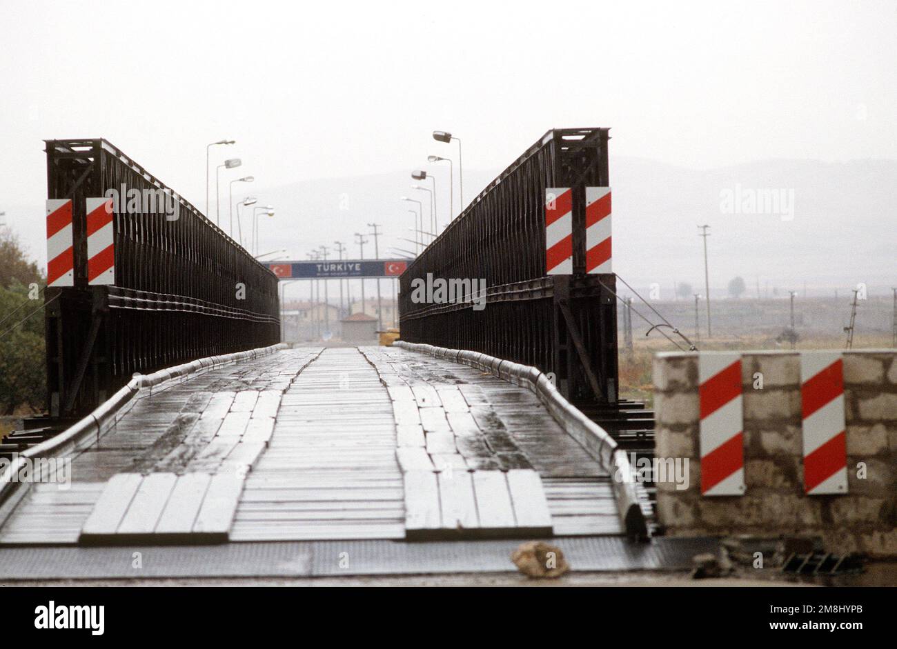 The Bailey bridge, built by US Army Engineers spans the width of the ...