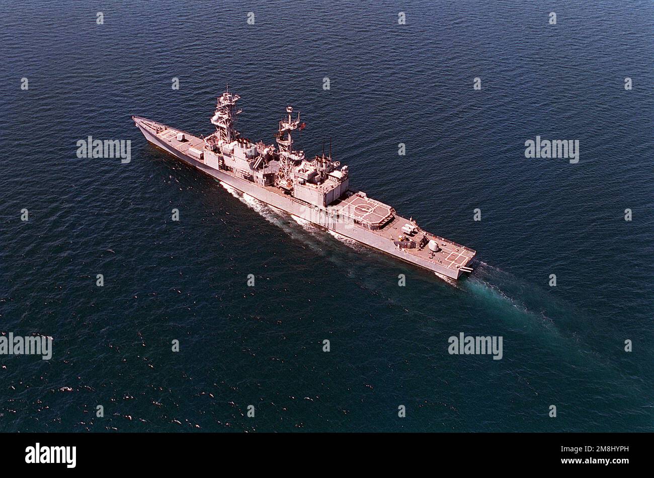 A port quarter view of the destroyer USS CONOLLY (DD-979) underway off ...