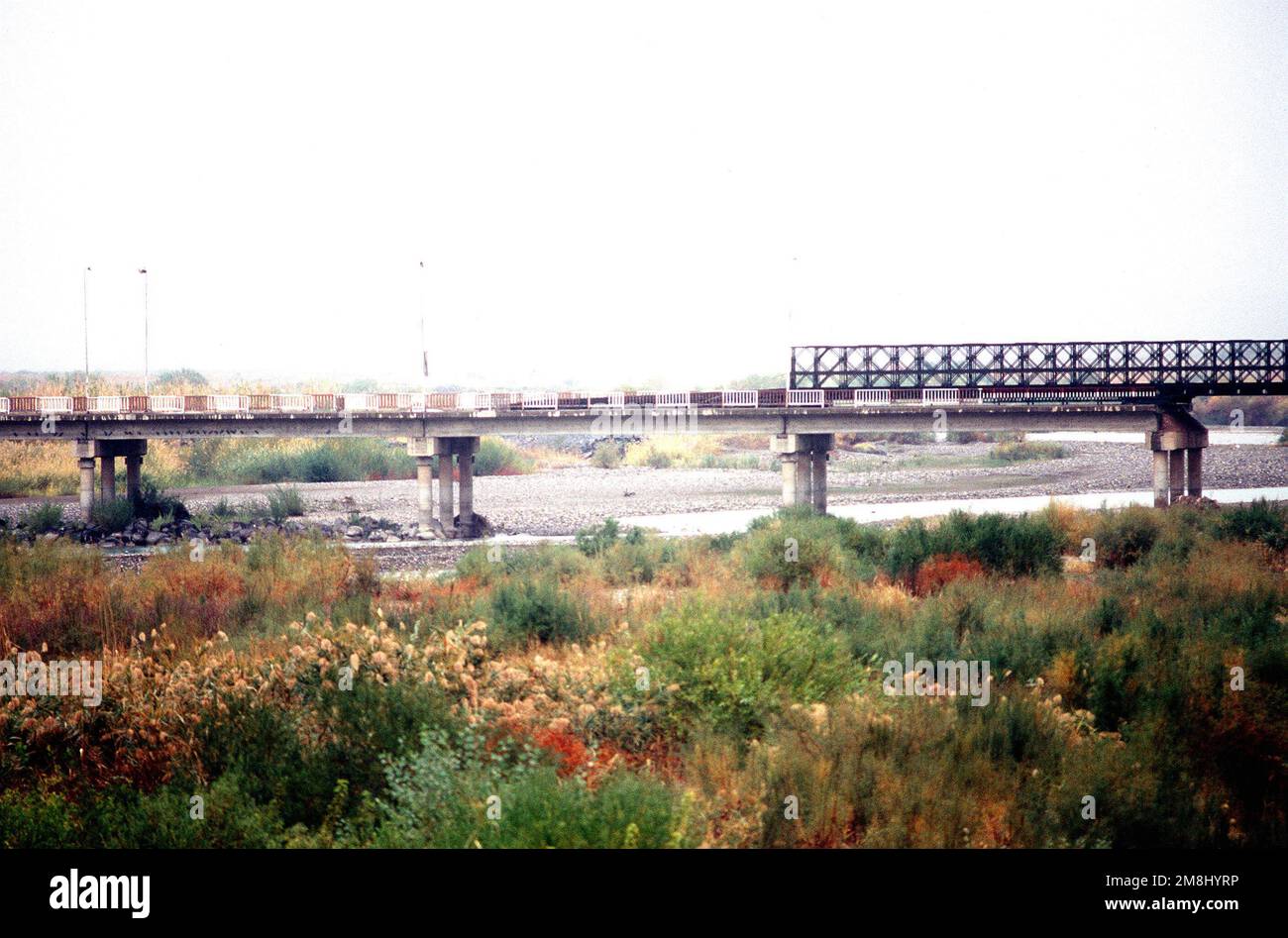 A side view of the Bailey bridge built by US Army Engineers spans the ...