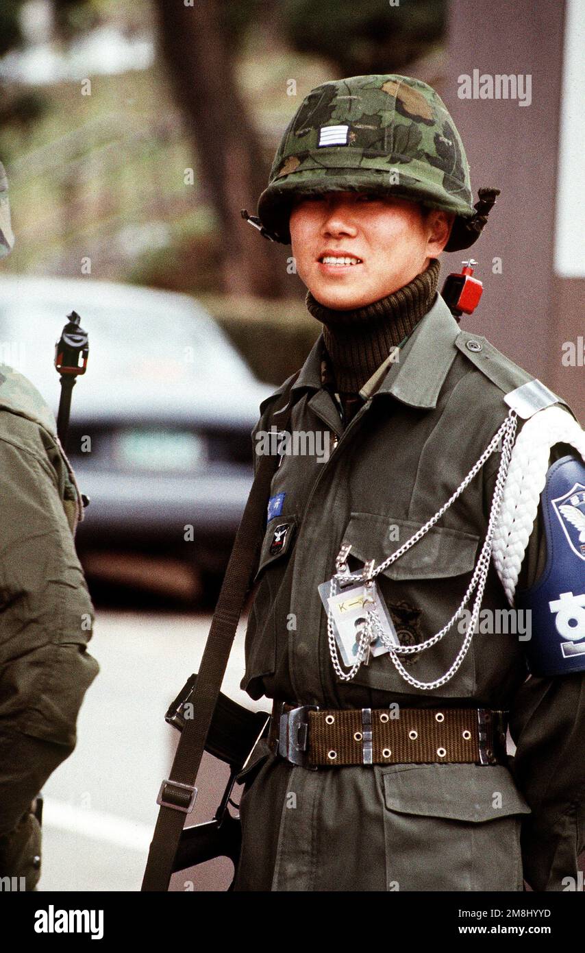 SGT. Park, Sung Gyv from the Korean military police stands guard with ...