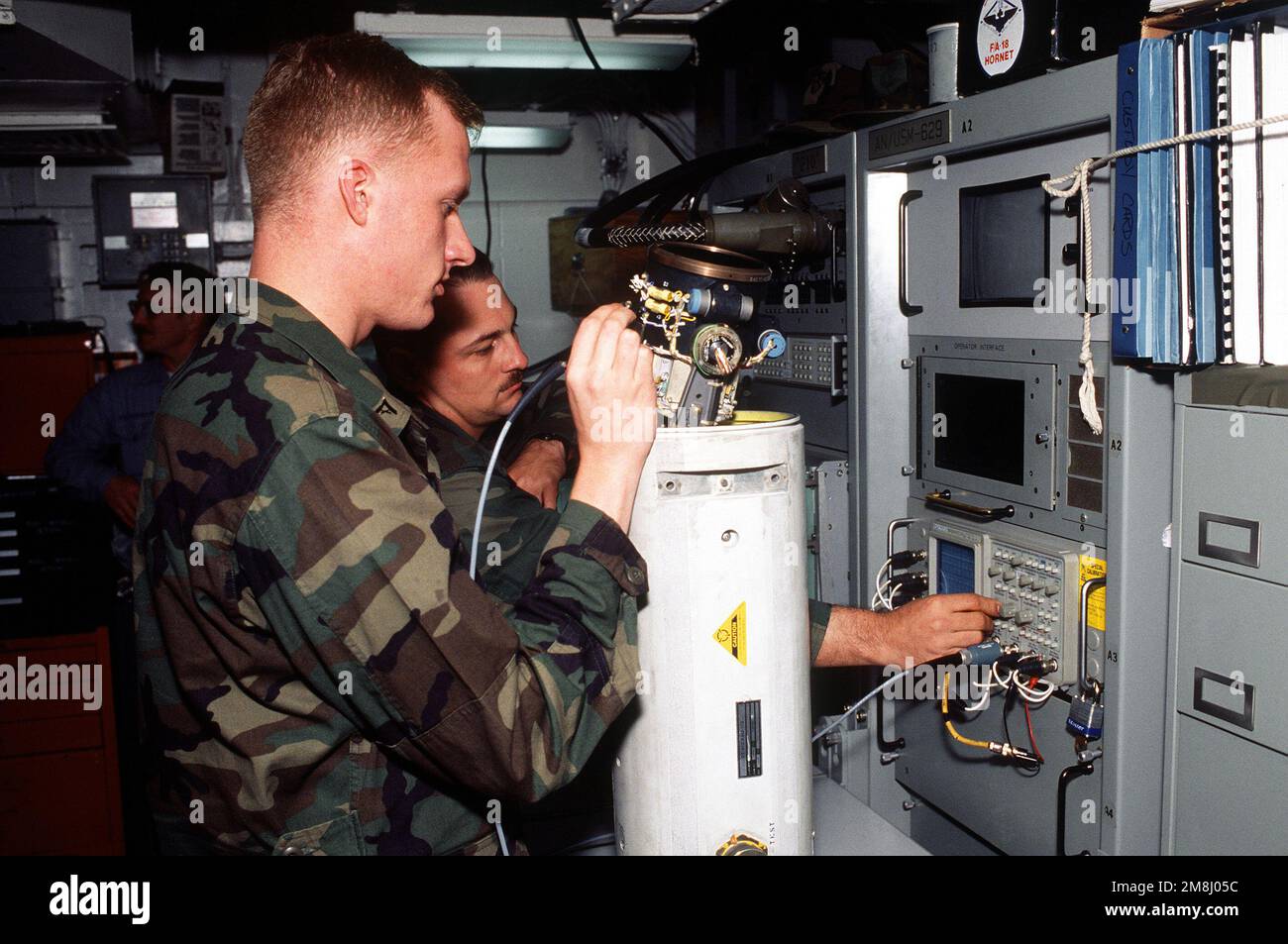 A Marine attached to Marine Strike Fighter Squadron 314 (VMFA-314 ...