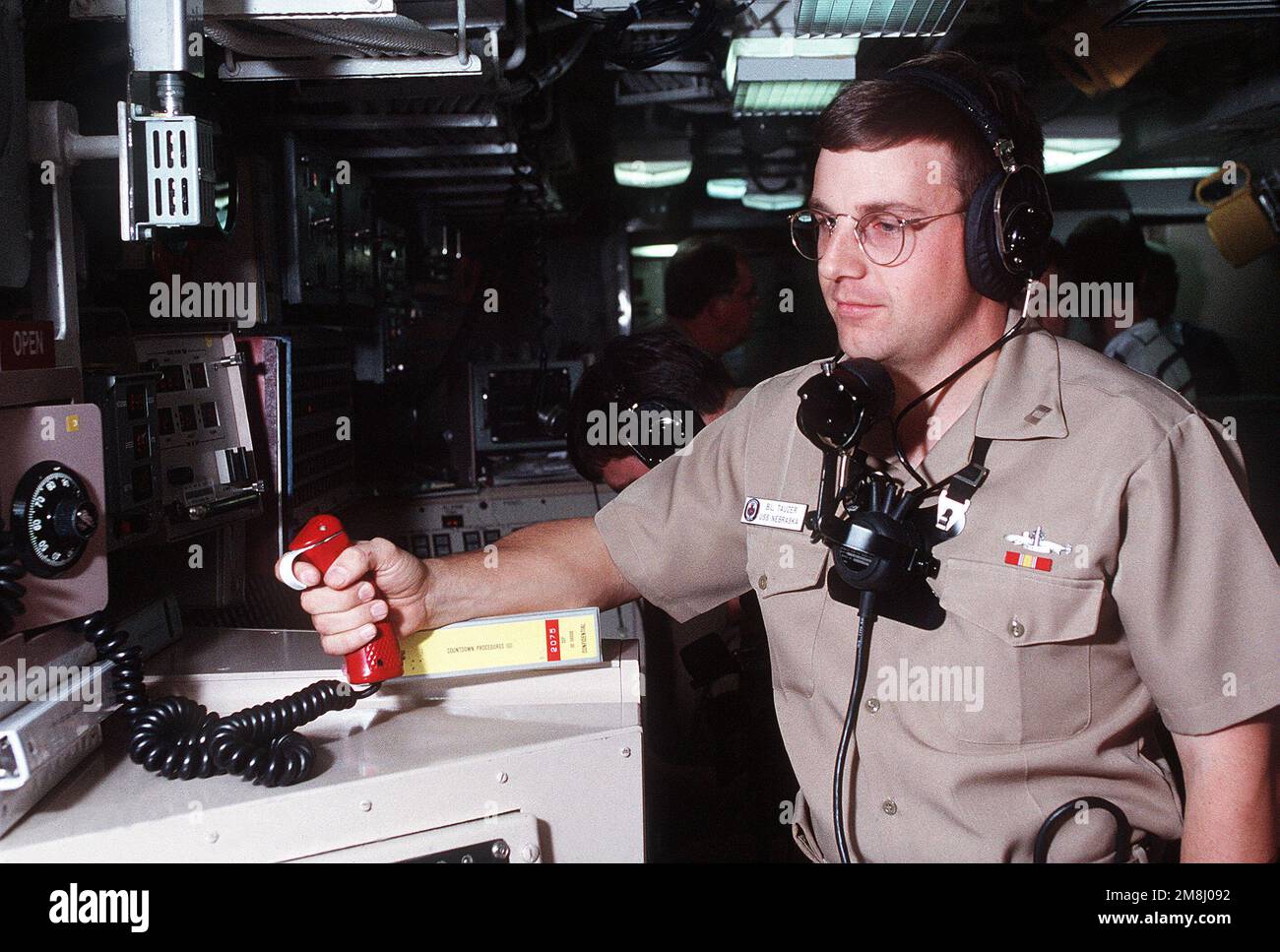 LT. Bryan Tauzer squeezes the trigger, launching a Trident II fleet ...