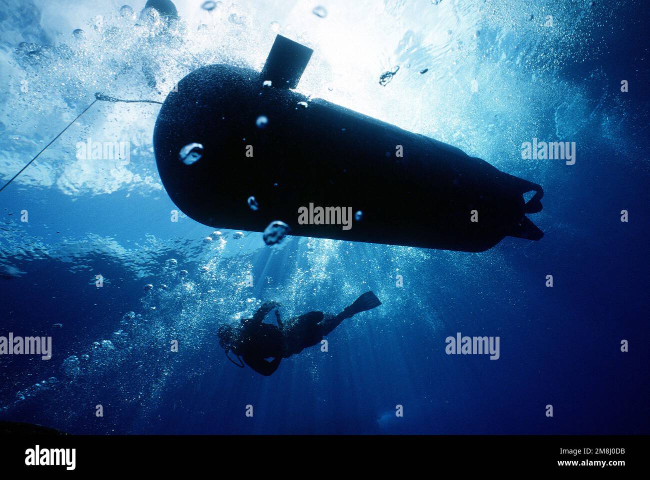 The deck captain of the nuclear-powered submarine USS KAMEHAMEHA (SSN ...