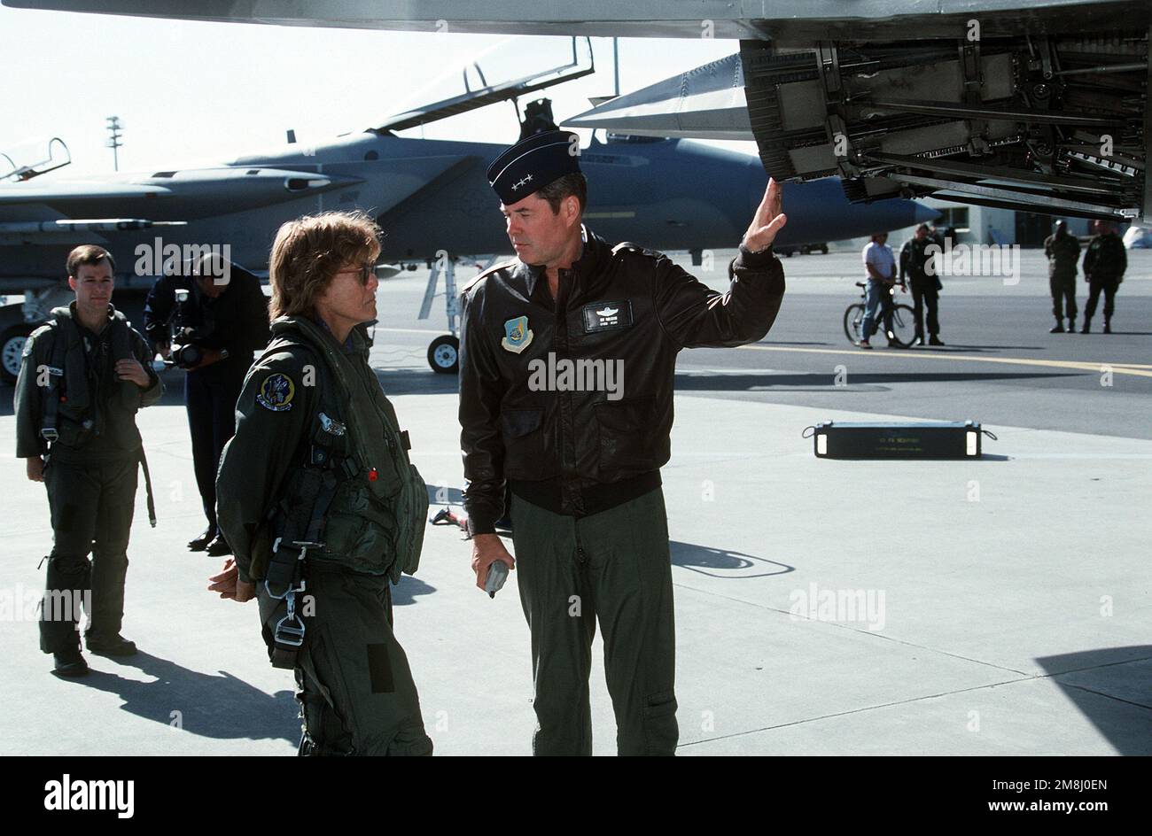 LT. GEN. Joe Ralston, 11th Air Force commander, gives Dr. Sheila ...