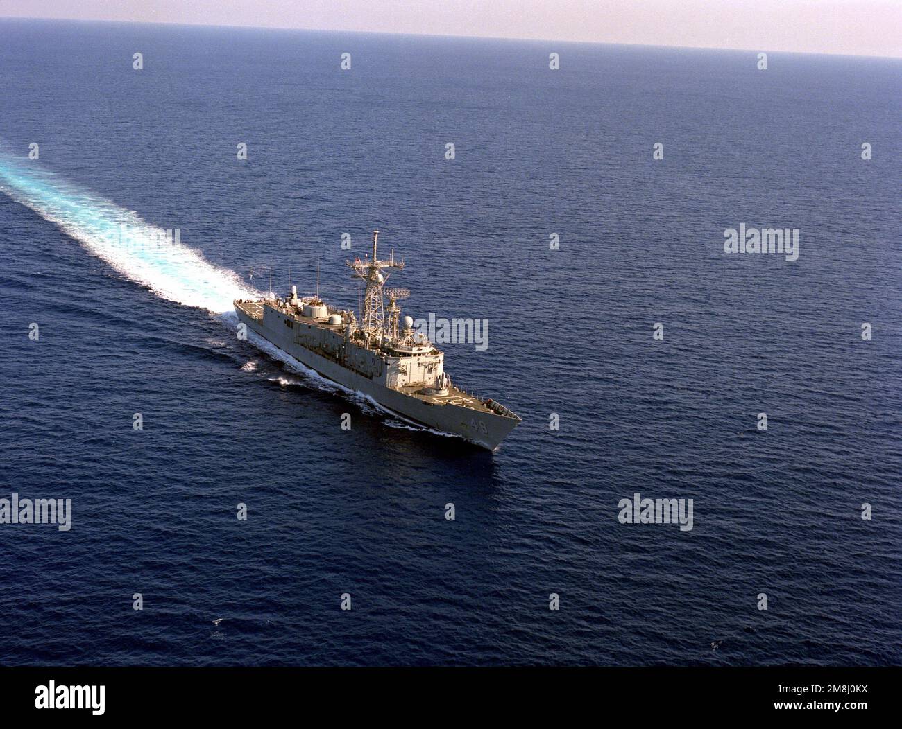 An starboard bow view of the Perry class guided missile frigate USS ...