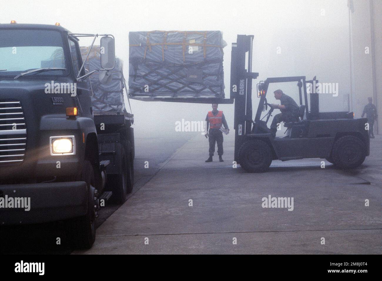 STAFF SGT. Spickerman from the 31st Special Operations Squadron loads ...