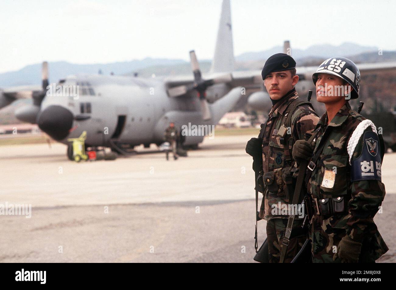 AIRMAN 1ST Class Leone from the 18th Security Police Squadron and Song ...