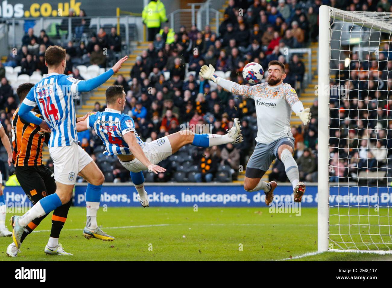 Matty Pearson #4 of Huddersfield Town attempts a shot on goal during ...