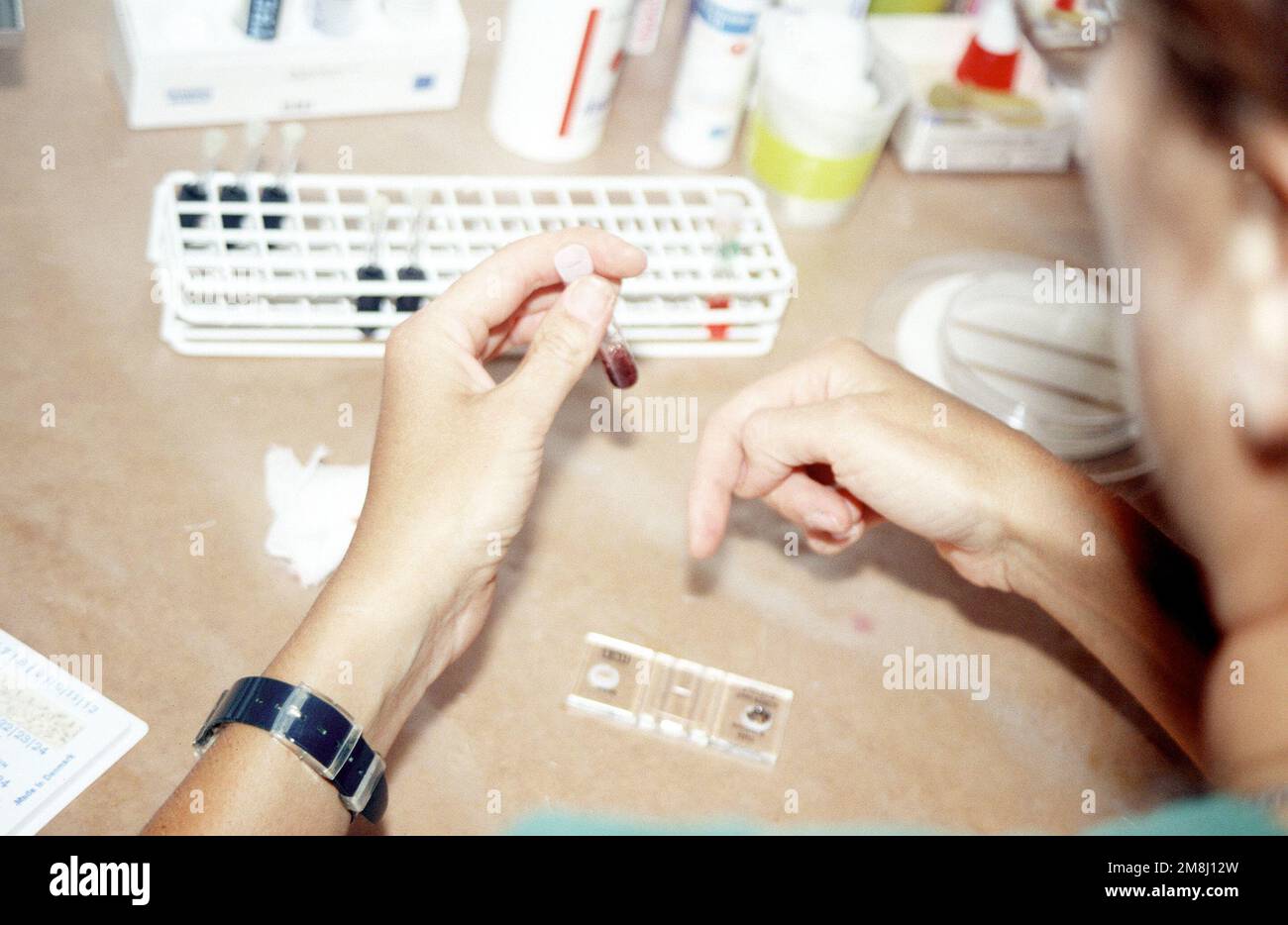 2nd LT. Gun Savhammar, 46th Combat Support Hospital, performs lab work ...