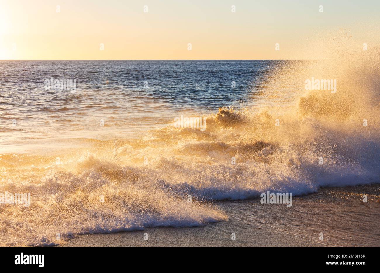 Blue wave on the beach. Dramatic natural background Stock Photo - Alamy
