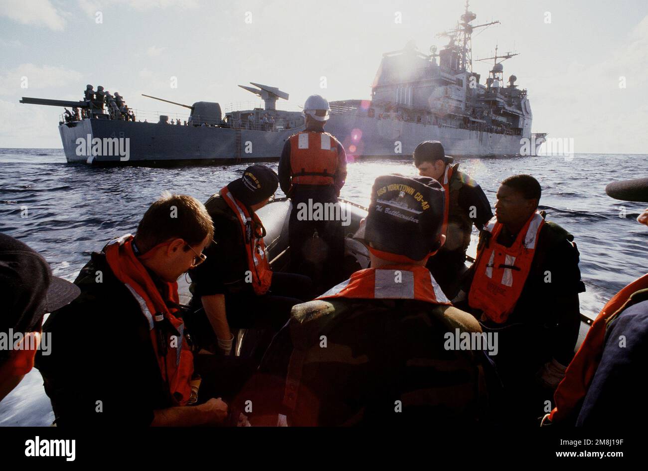 The boarding party from the guided missile cruiser USS YORKTOWN (CG-48 ...
