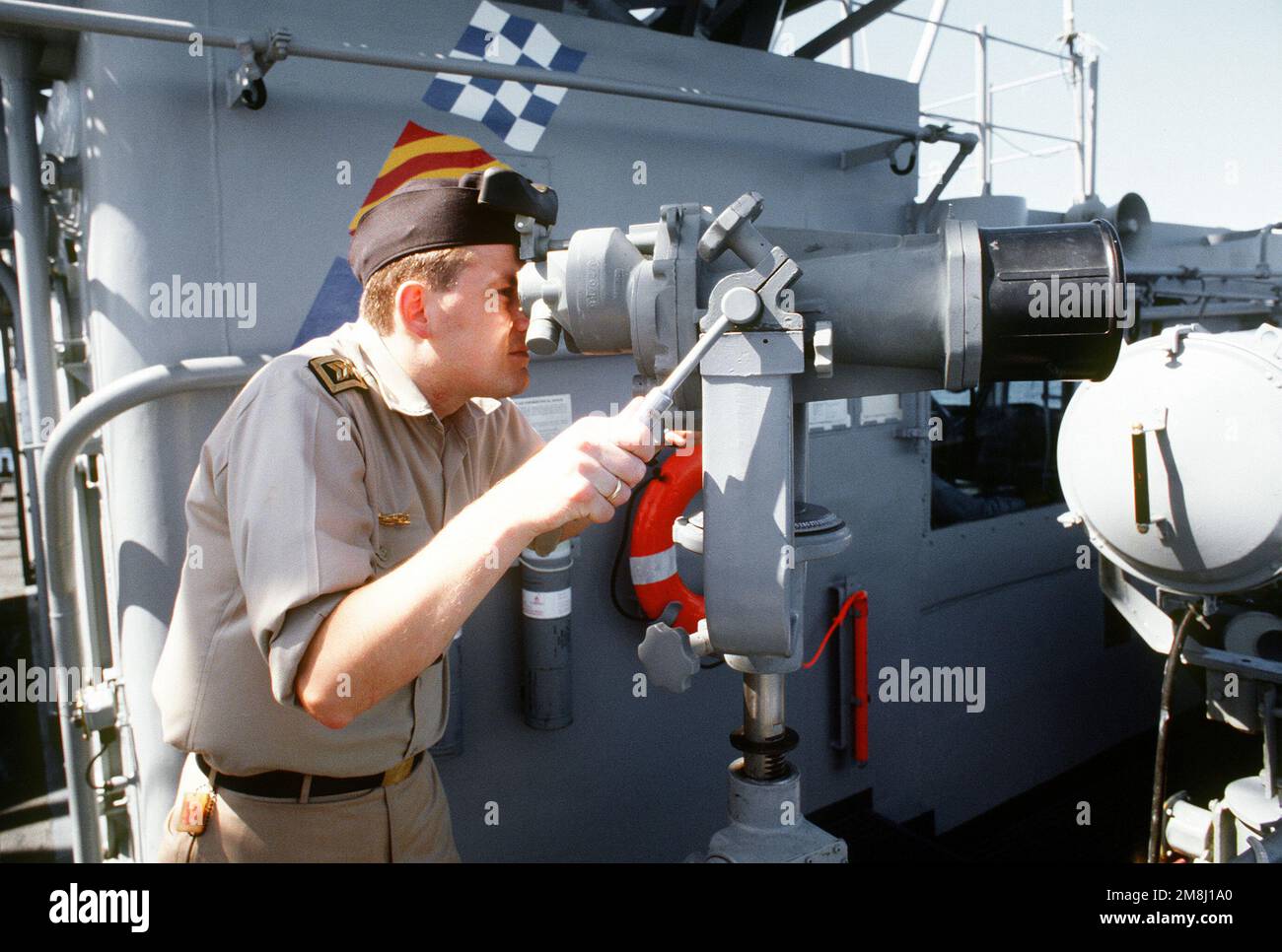 SENIOR CHIEF Quartermaster Thomas Voight of Kiel, Germany, takes a ...