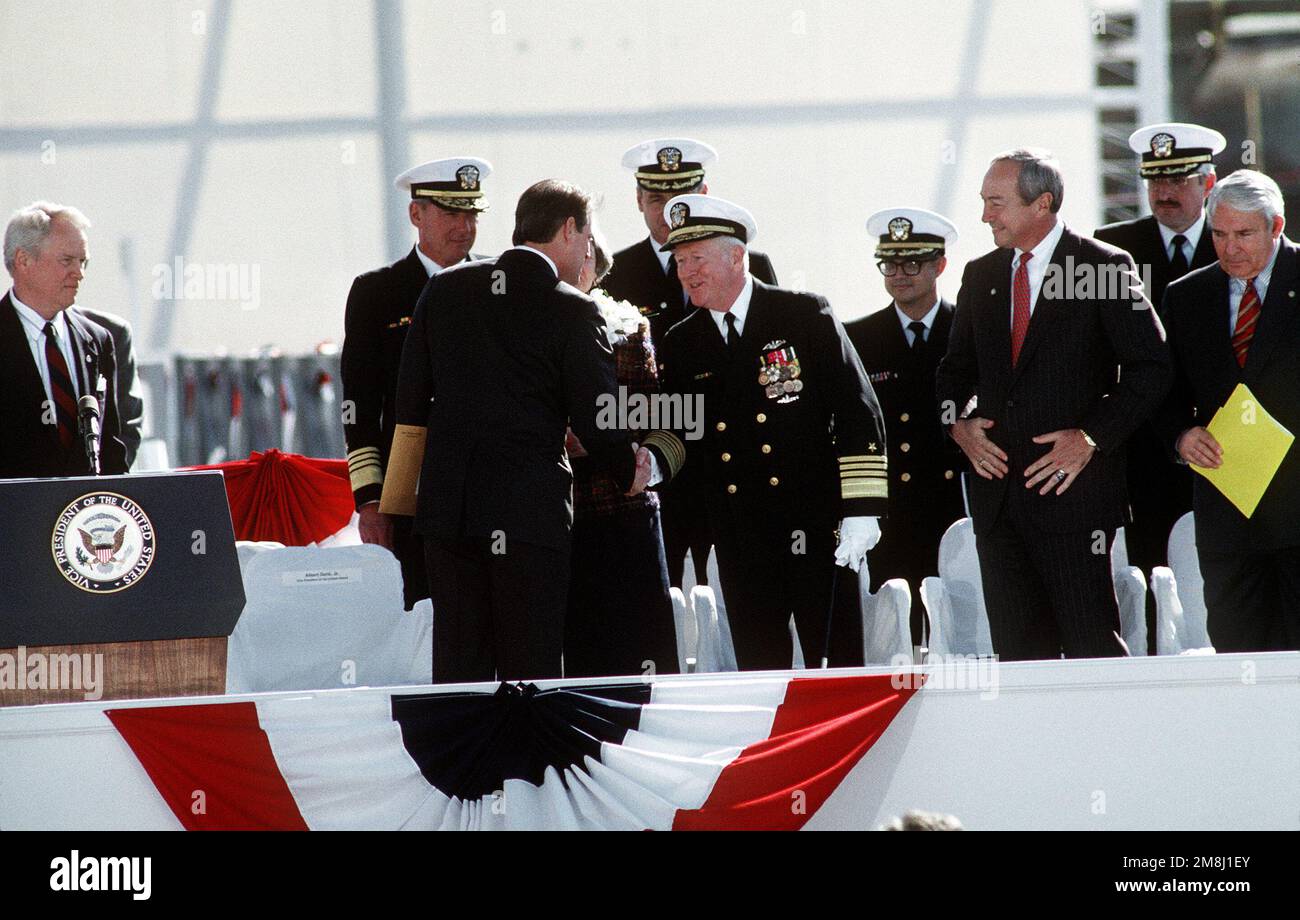 Vice President Al Gore shakes hands with Admiral Bruce DeMars, USN ...