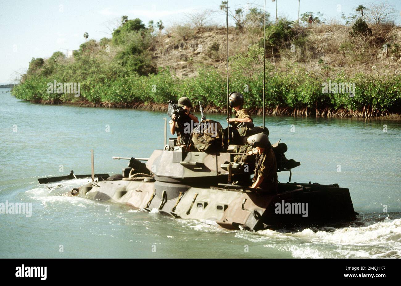 PH3 April Hatton from Navy Combat Camera Team videotapes the US Marines ...