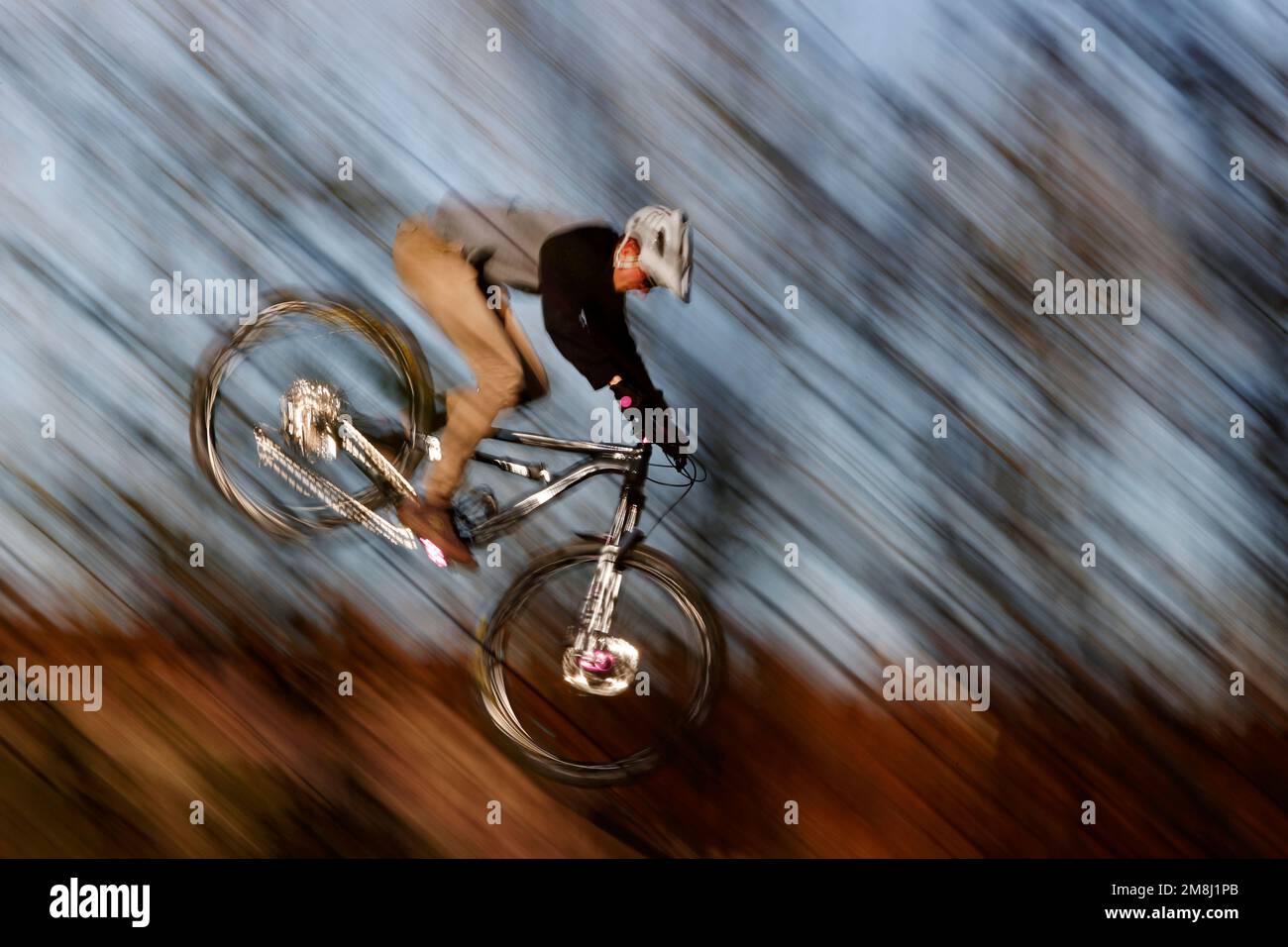 BMX and mountain bike riders in action at Fleet BMX and pump track in ...