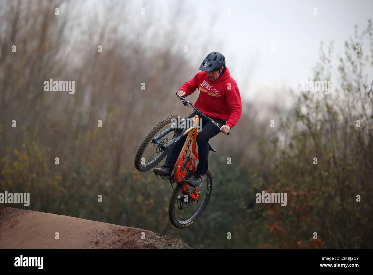 Mountain bike riders in action at a BMX and pump track near Fleet in ...