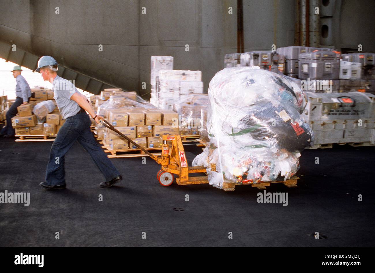 Members of the supply department on board the nuclear-powered aircraft ...