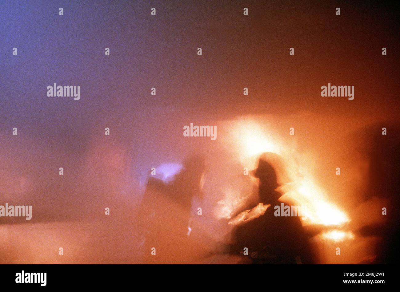 Students struggle to quench flames burning inside a blockhouse at Naval ...