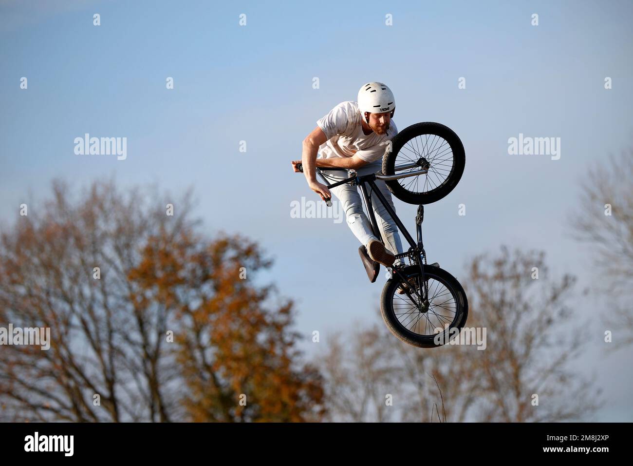 Mountain bike riders in action at a BMX and pump track near Fleet in ...