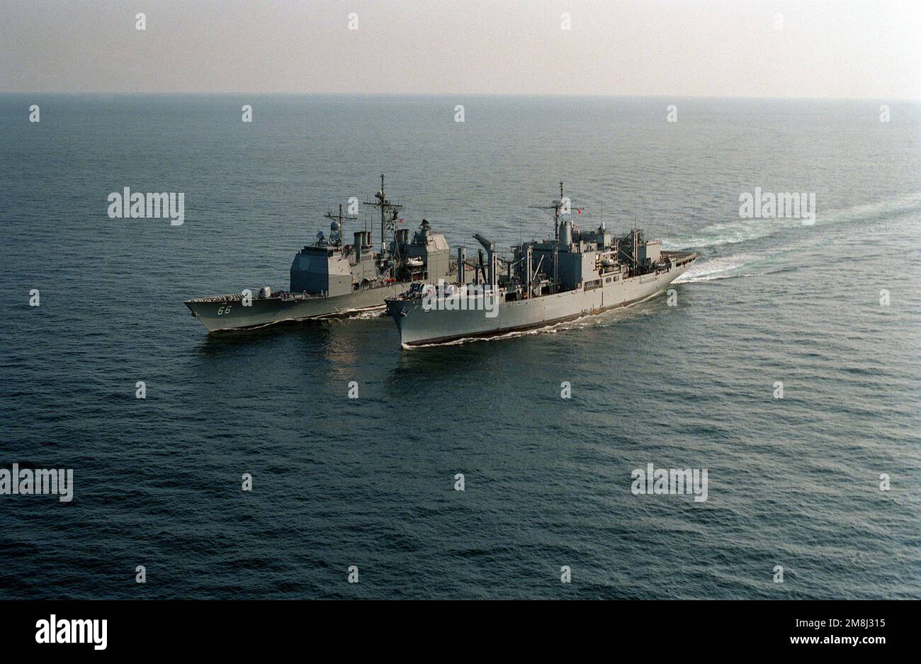 An aerial bow view of the Ticonderoga class guided missile cruiser USS ...