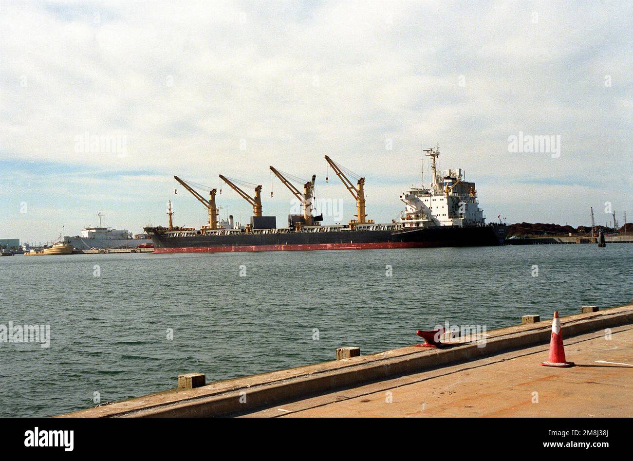 A port quarter view of a Russian heavy lift cargo ship tied up at a ...